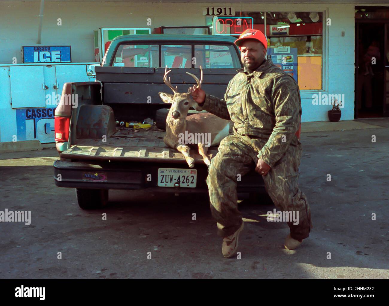 Deer hunter with his trophies at the historic Haupt's Country Store, a ...