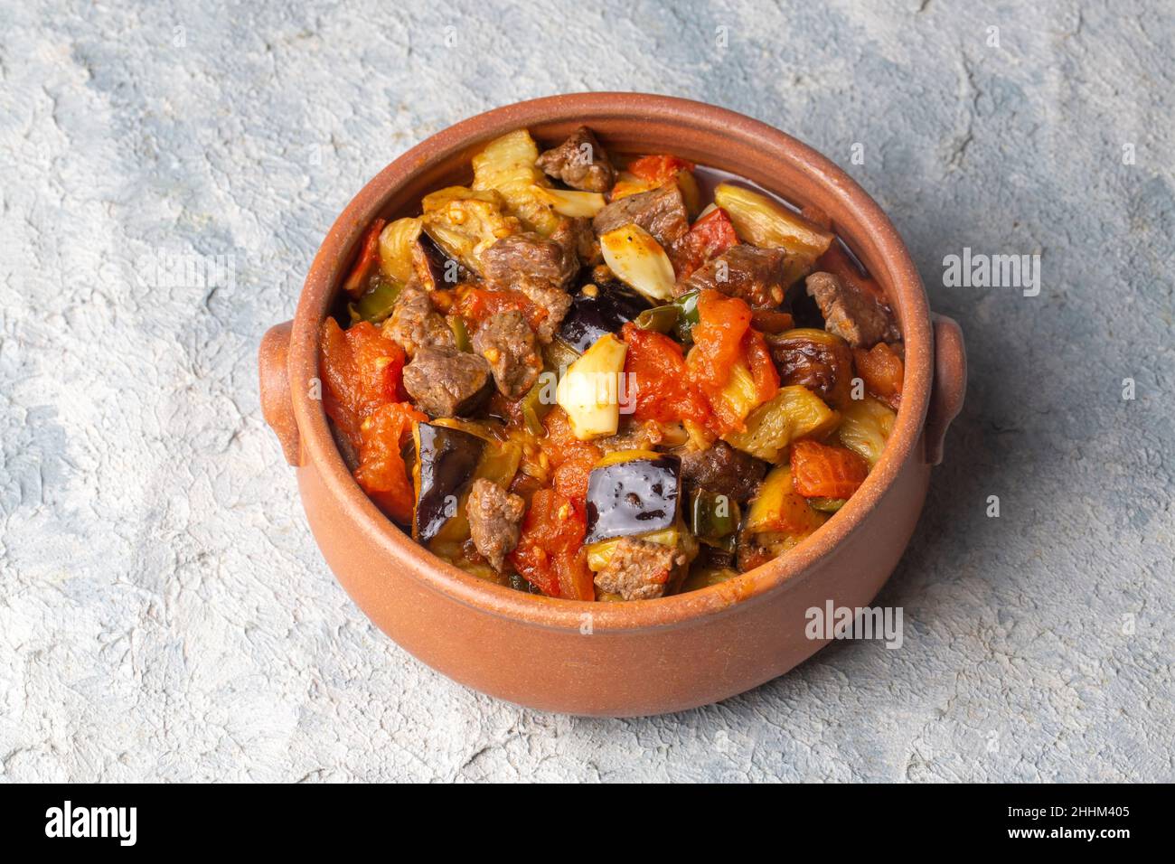 Top view of Turkish dish Guvech - baked meat with eggplant and ...