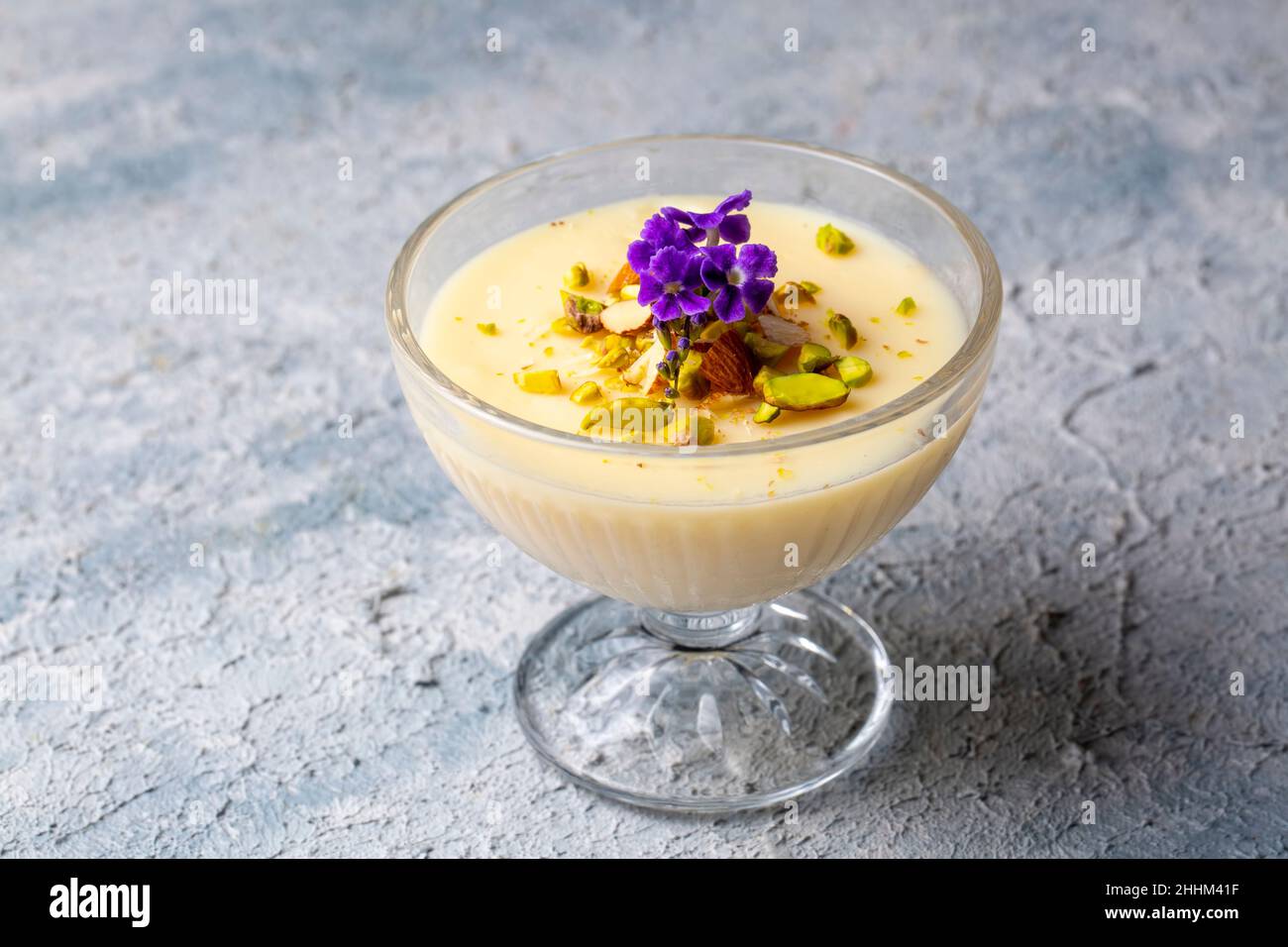 Traditional delicious Turkish Desserts; Keskul - Pudding Stock Photo ...