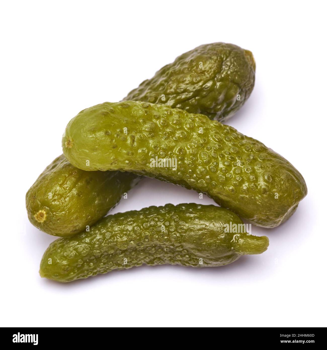 Tasty Whole green cornichons isolated on a white background Stock Photo ...