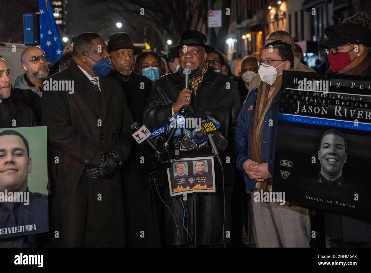 New York, United States. 24th Jan, 2022. Members of the community and ...