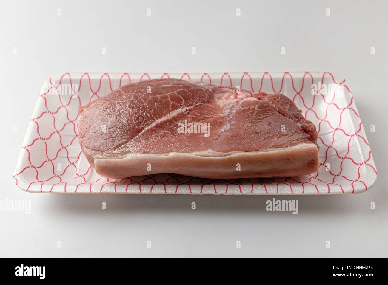 Pork front leg meat on white background Stock Photo - Alamy