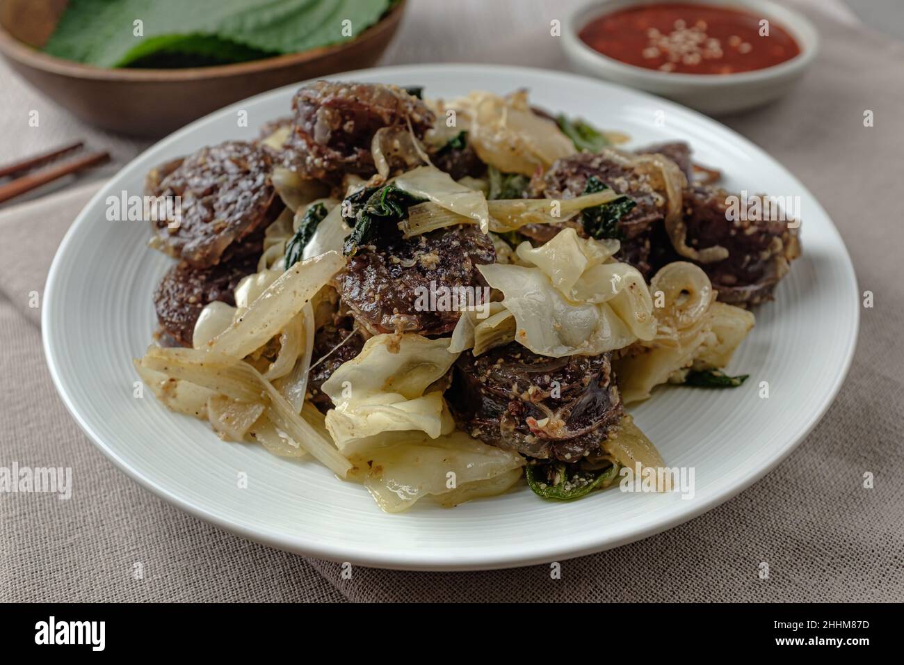Korean dish made with stir-fried sundae and vegetables Stock Photo - Alamy