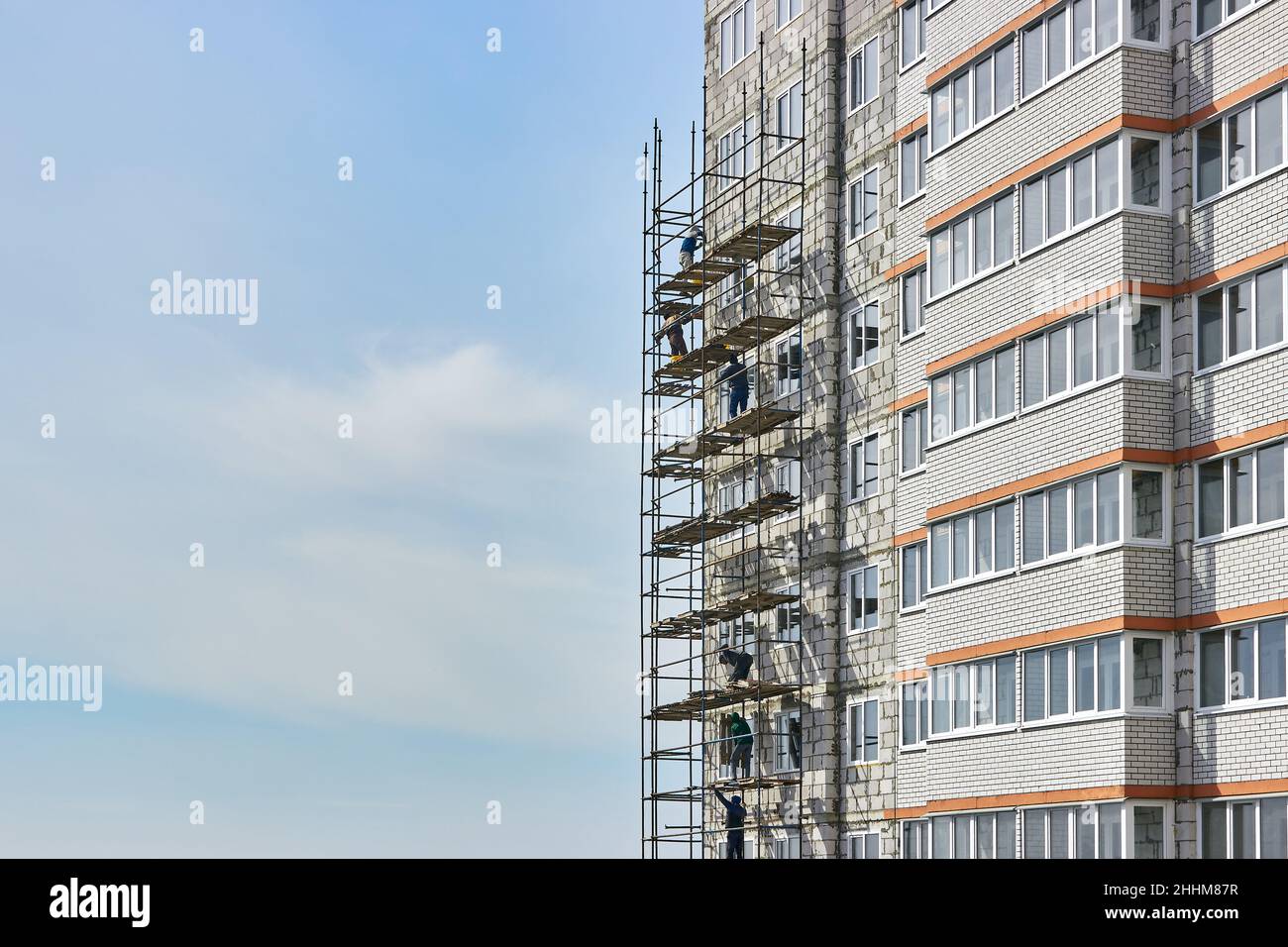 Builders work without means of protection, insurance. Installation of ...