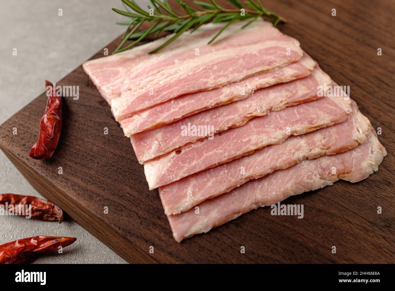 Thinly sliced fatty pork bacon Stock Photo - Alamy