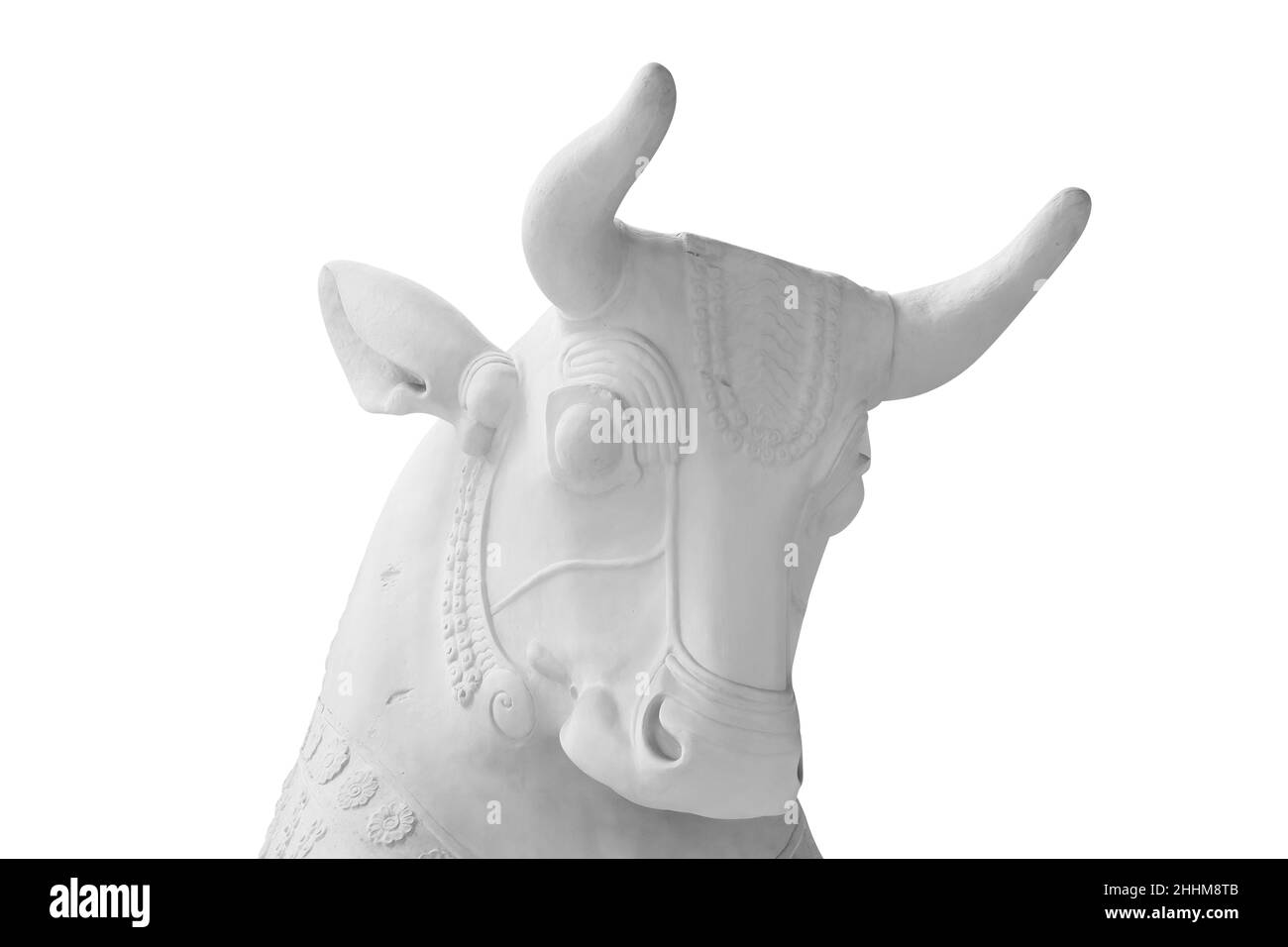 Stone statue. Bull isolated on a white background with clipping path ...