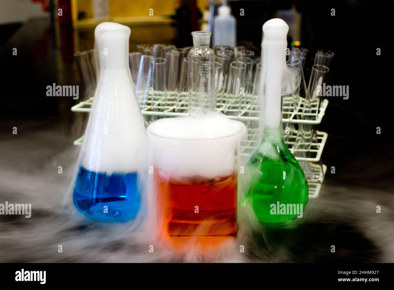Dry Ice in different colored solutions Stock Photo - Alamy