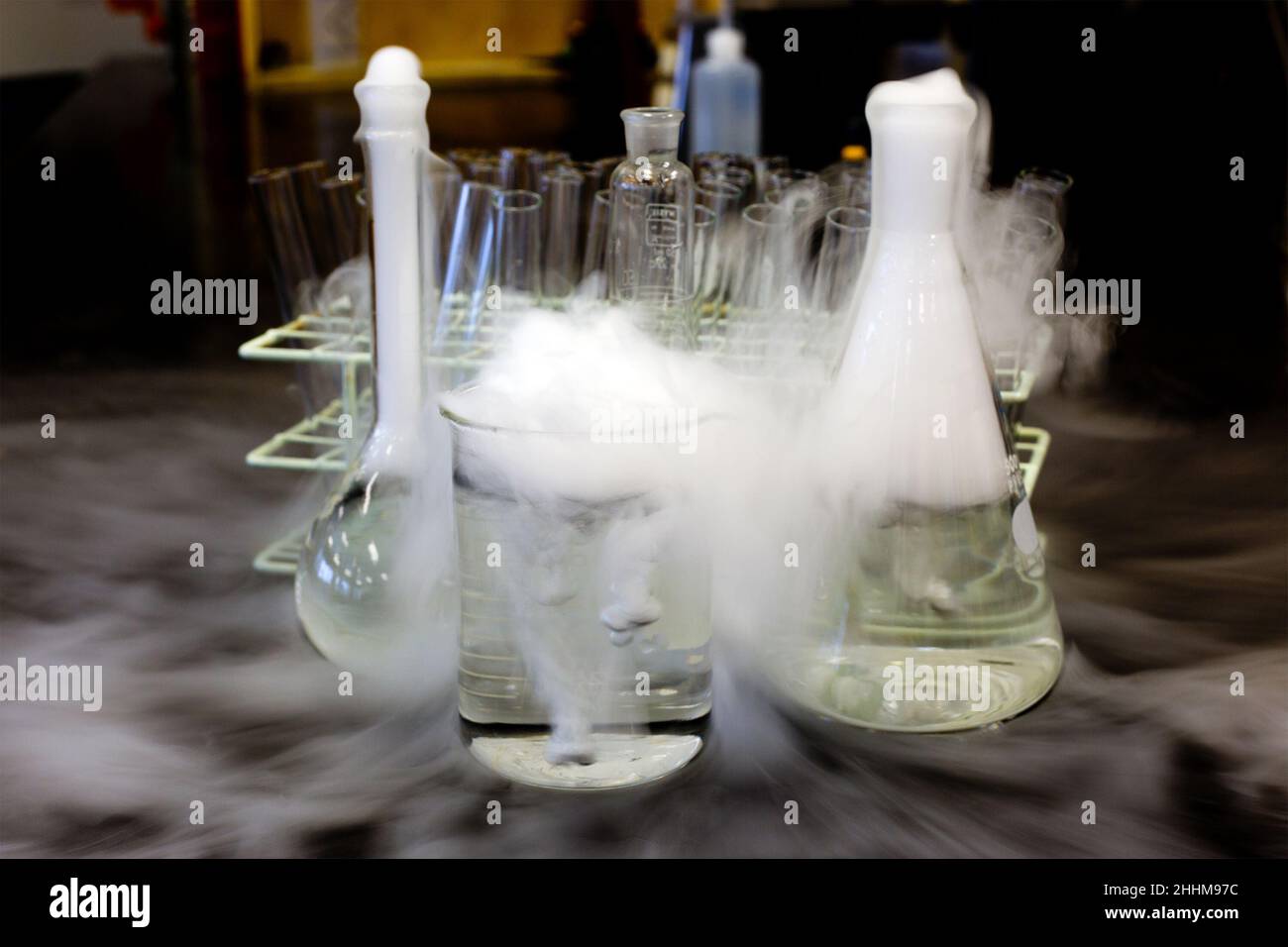Dry Ice in chemical flasks Stock Photo - Alamy