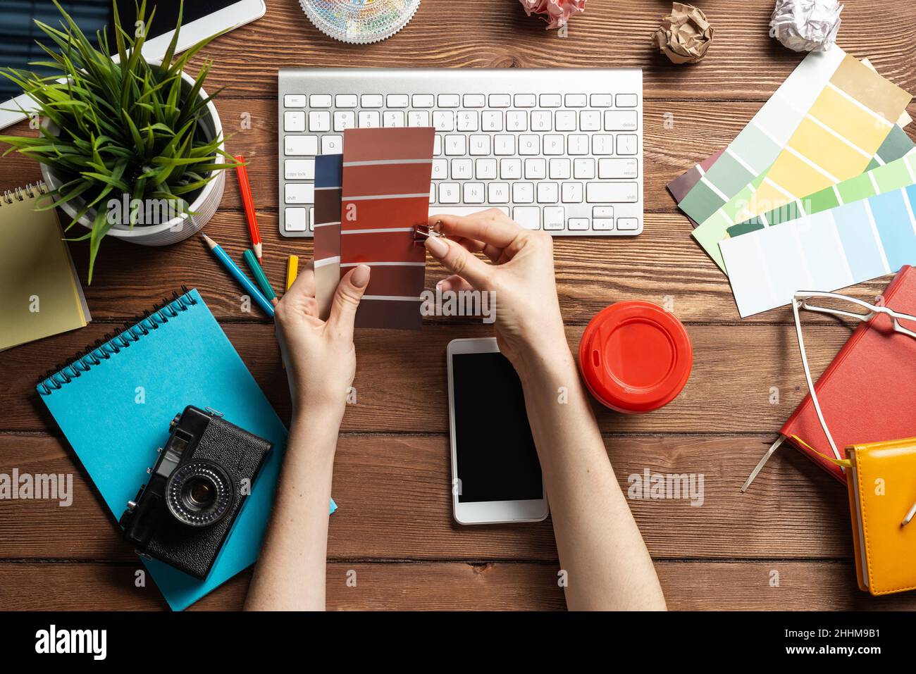 Web designer choosing colors from swatches Stock Photo - Alamy