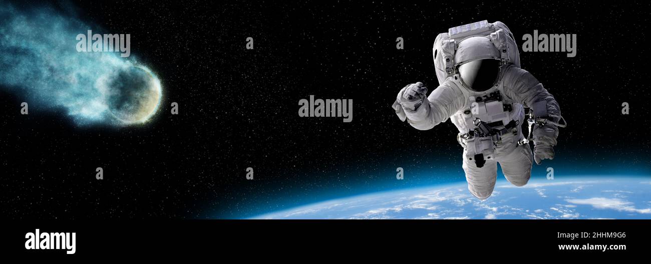 Astronaut in outer open space over the planet Earth.Stars provide the ...