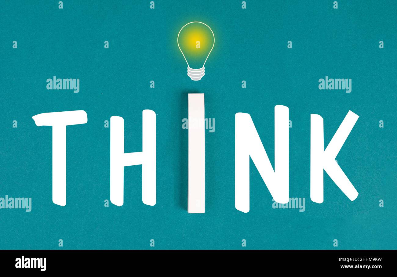The word think is standing on a petrol colored background, light bulb ...