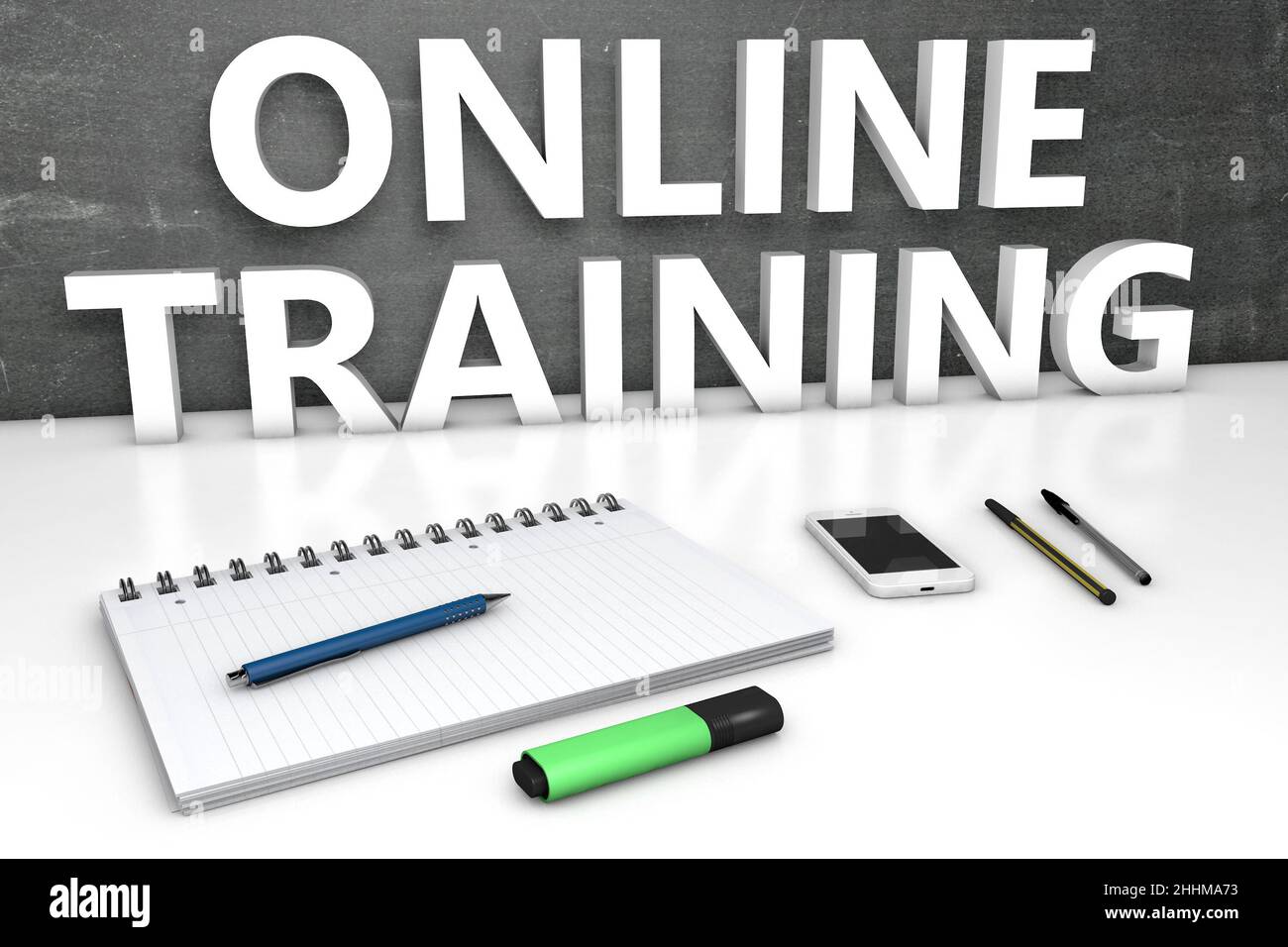Online Training - text concept with chalkboard, notebook, pens and ...