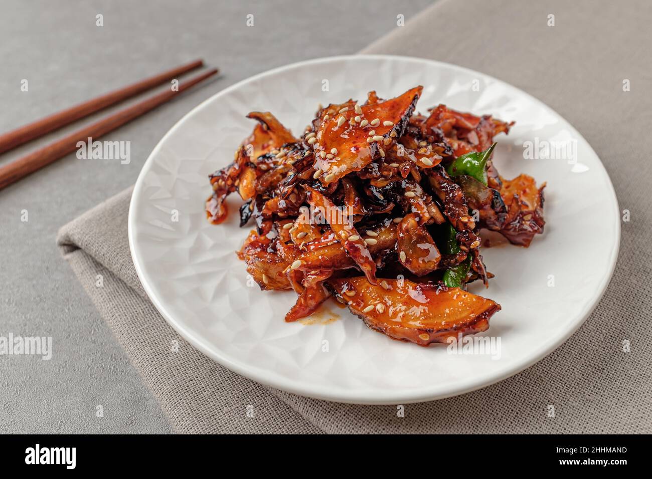 Thinly sliced octopus simmered in spices Stock Photo - Alamy