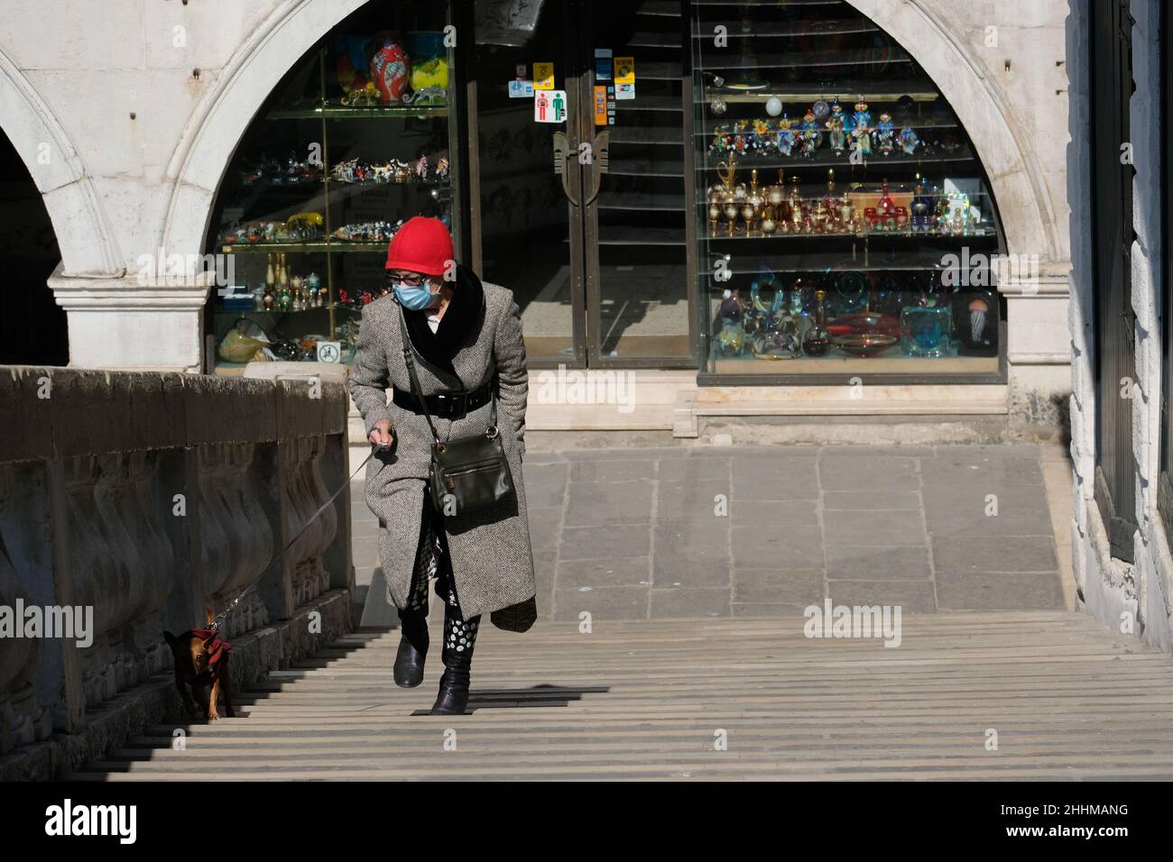 A citizen walks the empty street of Venice during lockdown for ...