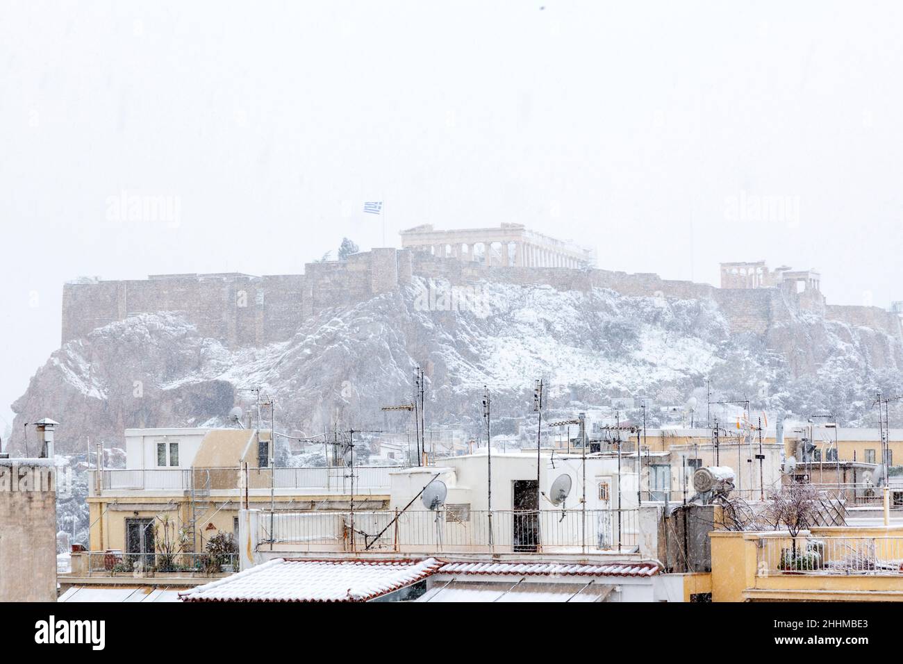 Snowfall in Athens, Greece, in January 24th 2022. The famous Acropolis ...