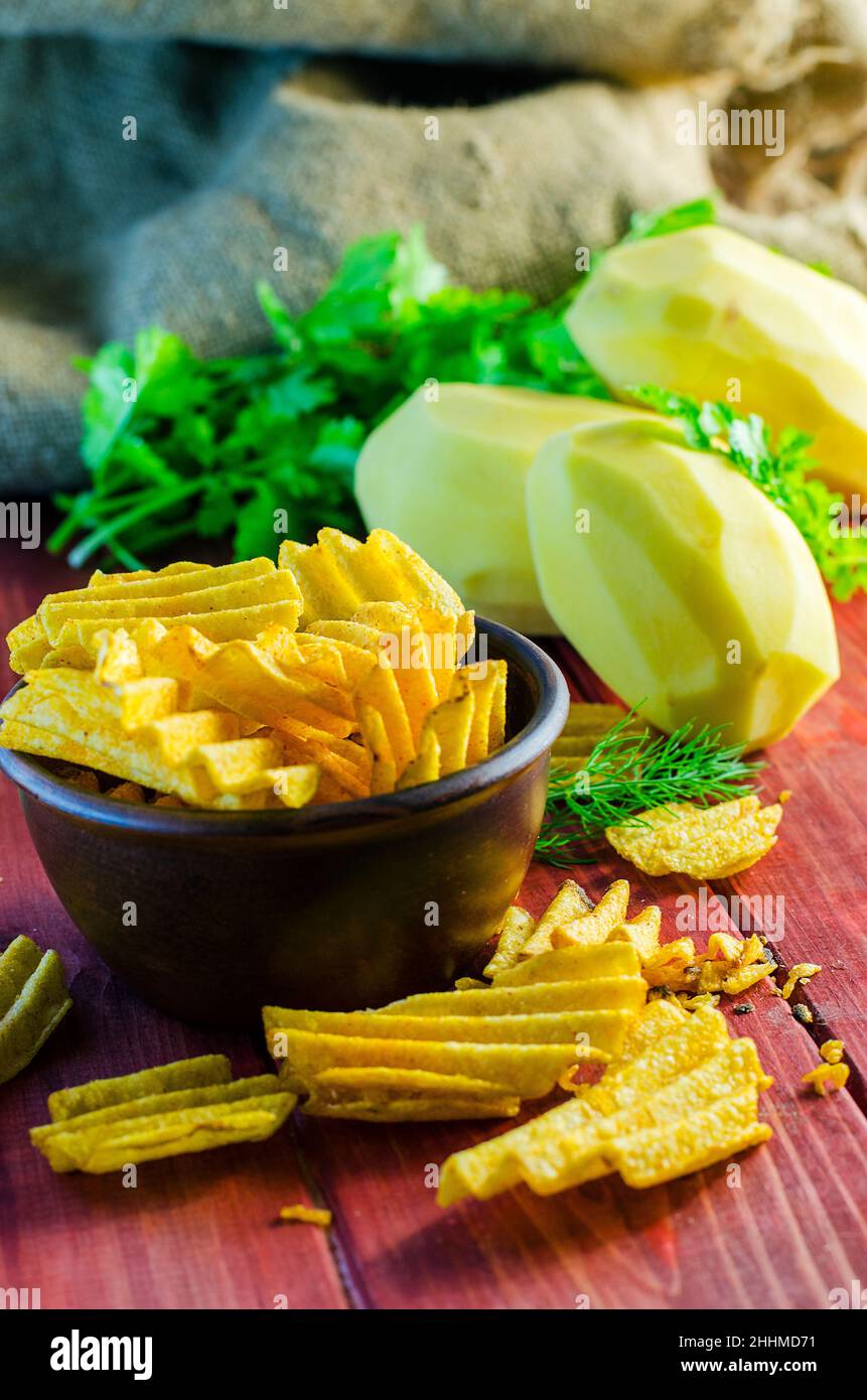 fried potato chips on the table and ingredients Stock Photo - Alamy