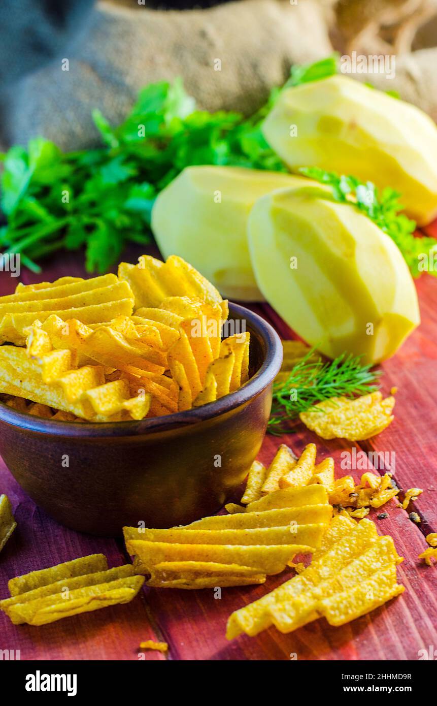 fried potato chips on the table and ingredients Stock Photo - Alamy