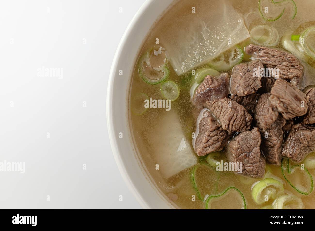 Beef radish soup on a white background Stock Photo - Alamy