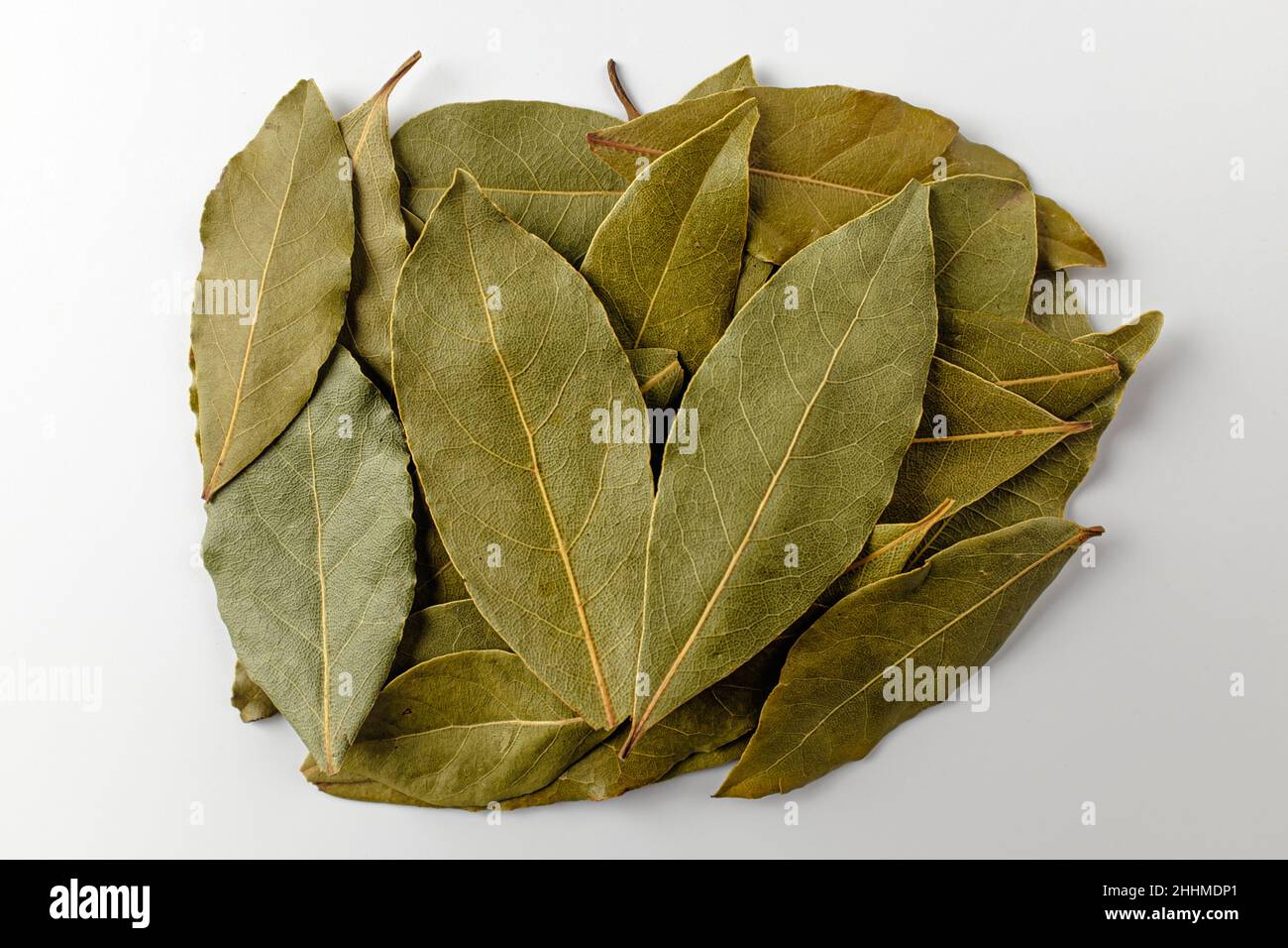 Bay leaves on a white background Stock Photo - Alamy