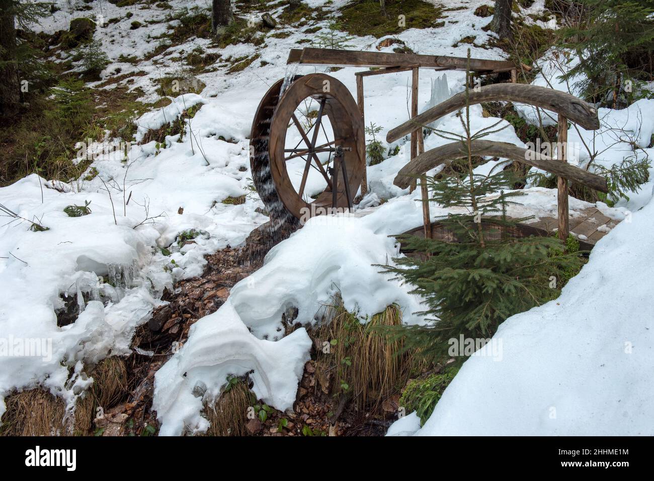 Wooden water wheel in the forest at winter Stock Photo - Alamy