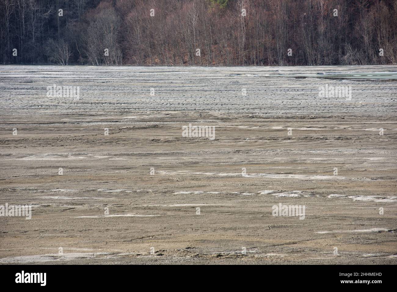 Muddy waters in a decantation pond. Toxic residuals from a copper mine ...