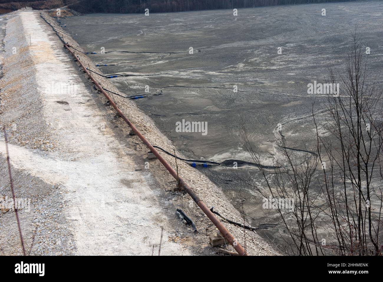 Barrier stopping the flow of copper and gold mining mining residuals ...
