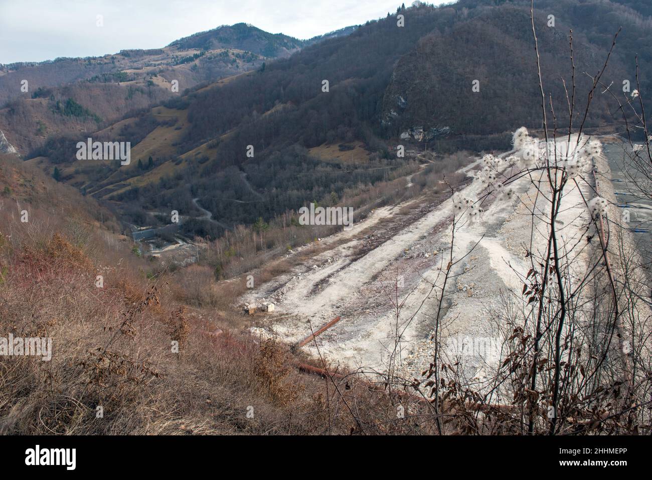 Barrier stopping the flow of copper and gold mining mining residuals ...