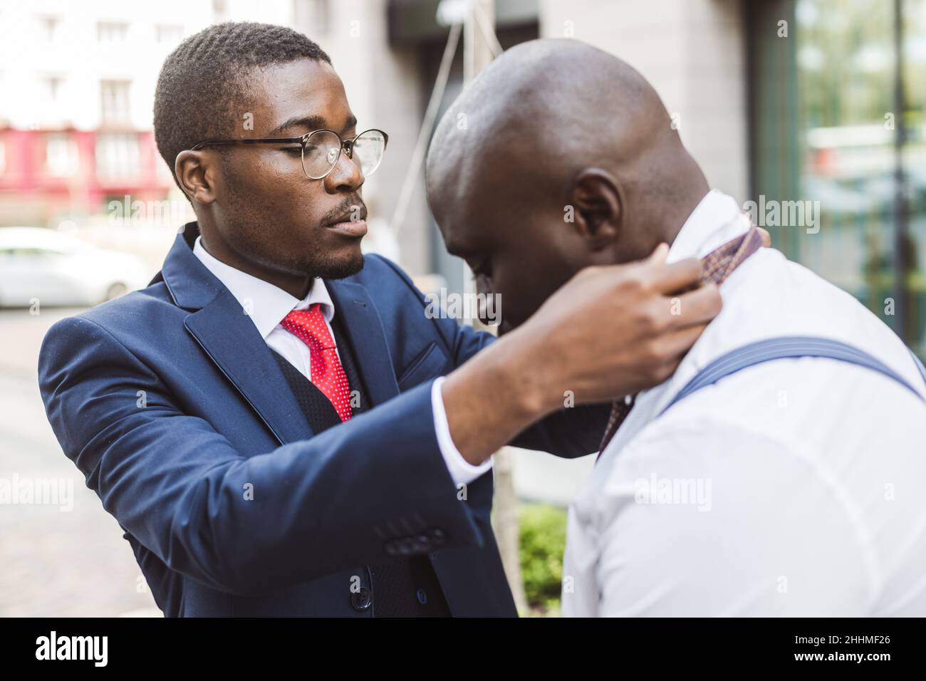 Two black African American businessman friends before an important ...