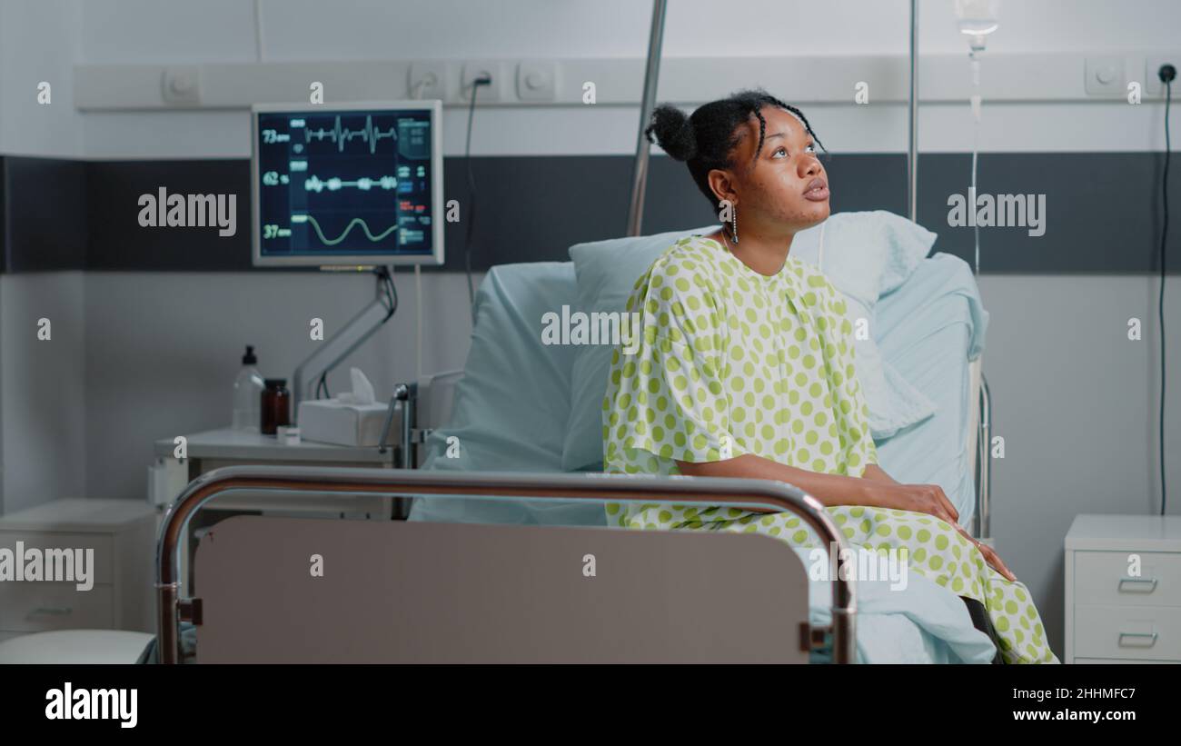 Sick patient waiting on doctor to give treatment and support while ...