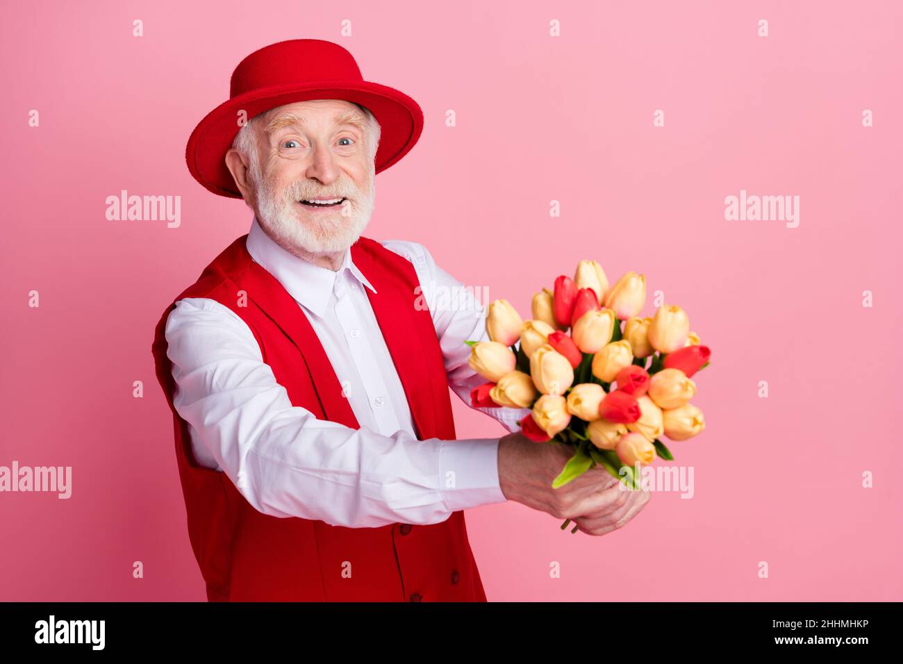 Photo of aged man happy positive smile give tulips flower present ...