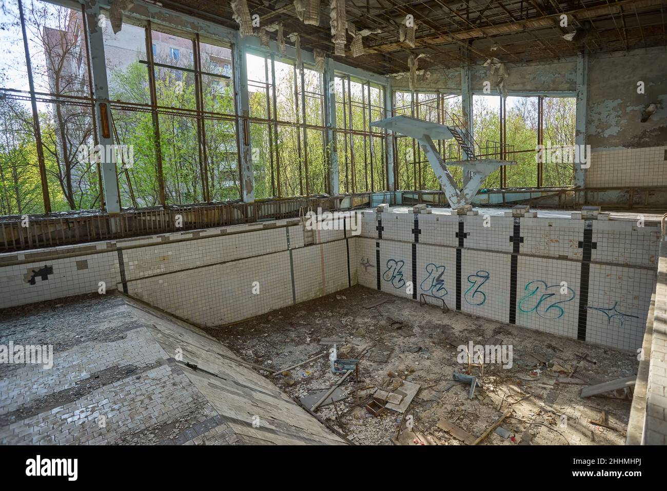 Abandoned swimming pool in Pripyat. Destroyed gym in a radioactive city ...