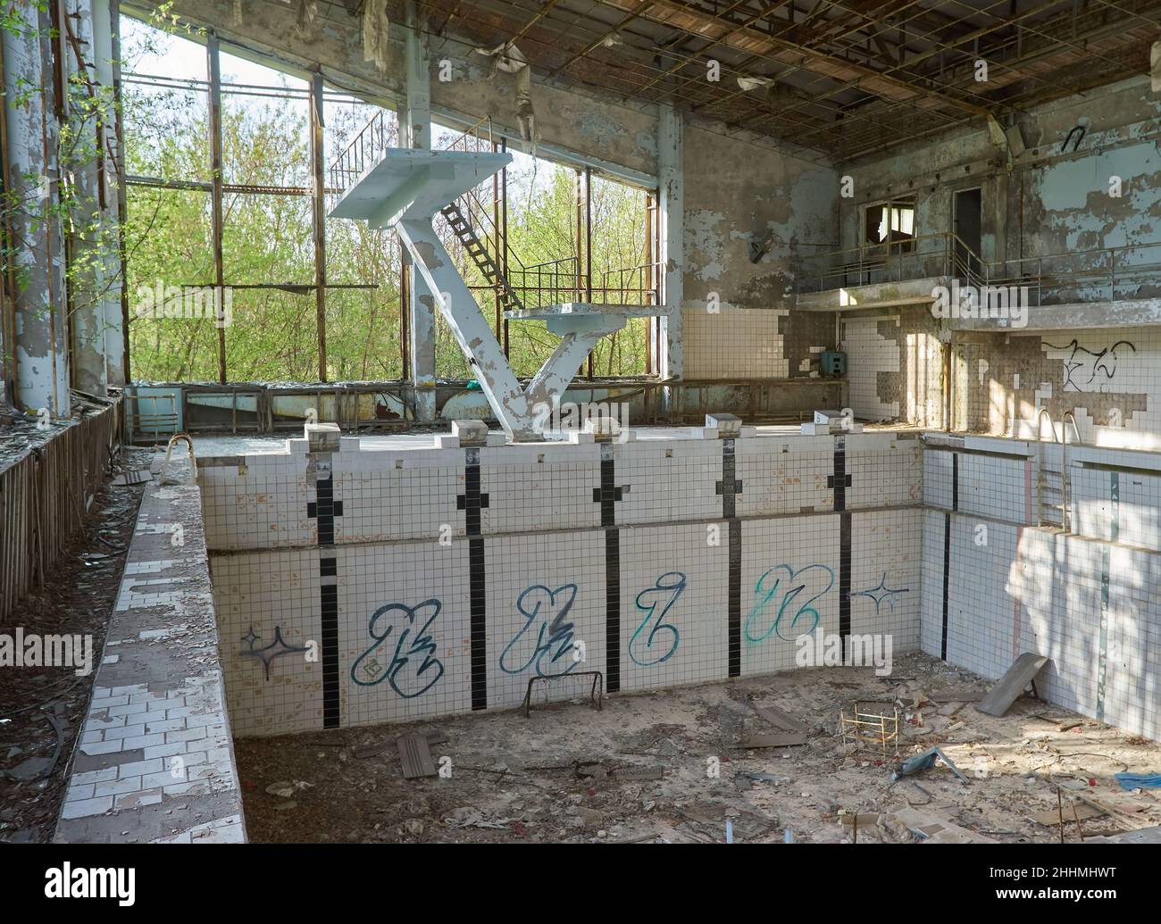 Abandoned swimming pool in Pripyat. Destroyed gym in a radioactive city ...