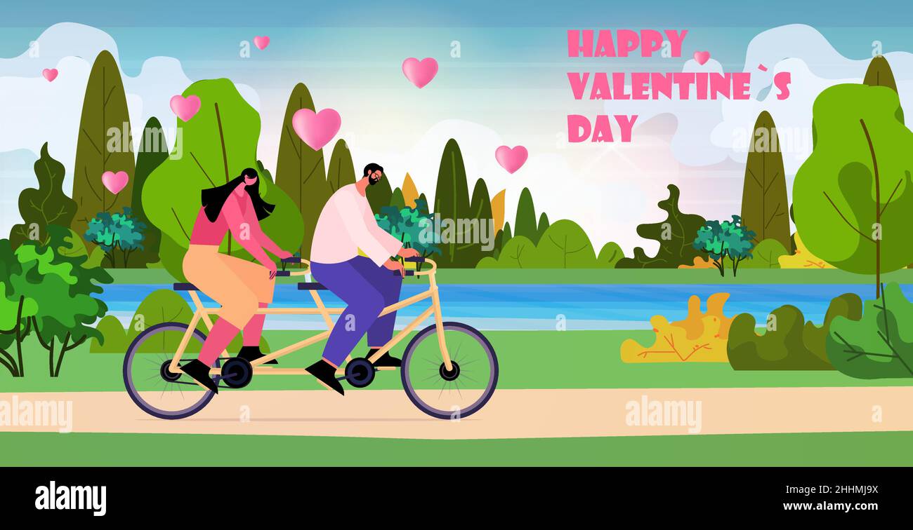couple in love riding tandem bicycle celebrating happy valentines day ...