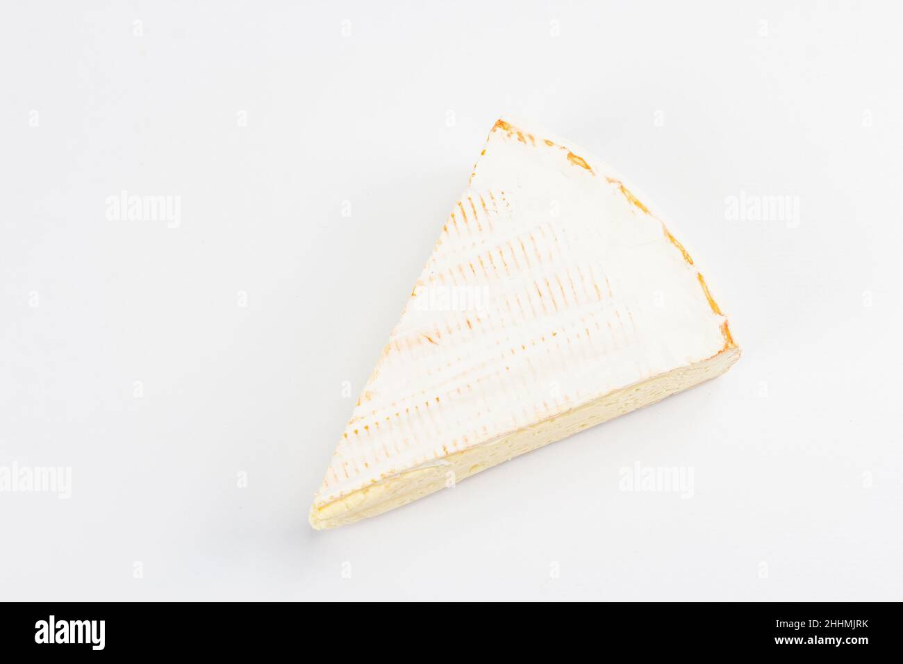 Rougette cheese isolated on white background. Soft-ripened red rind ...