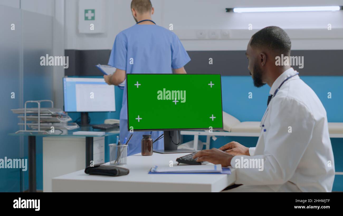 African american therapist doctor typing sickness expertise analyzing ...