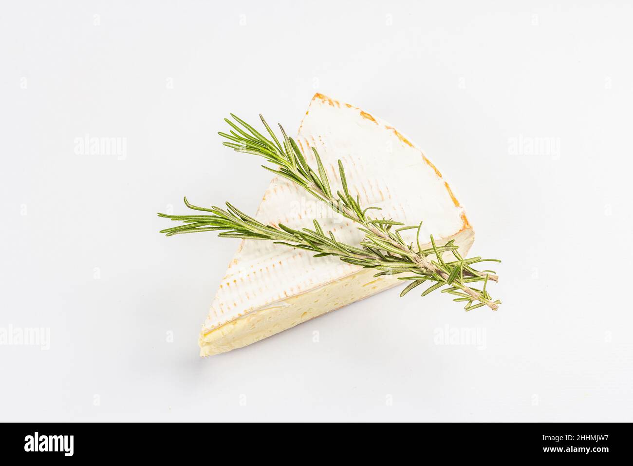 Rougette cheese with fresh rosemary isolated on white background. Soft ...