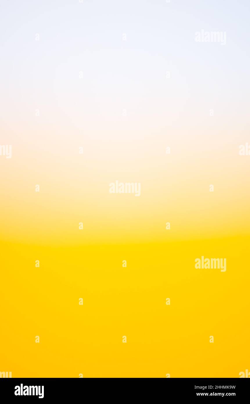 Abstract multicolored background with blurry yellow and white gradients ...