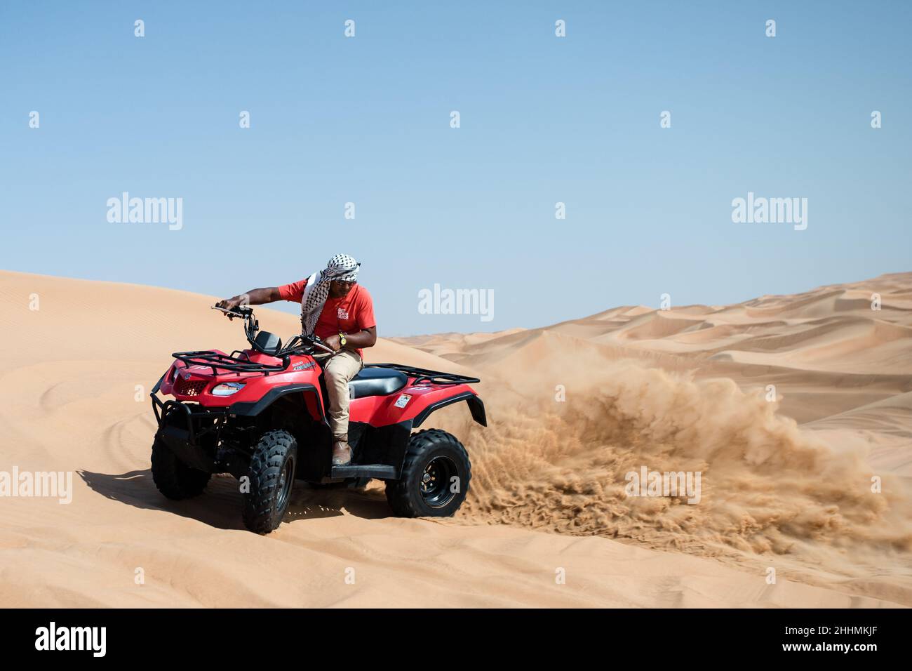 ATV Riding and Dune Bashing on a Desert Safari in Dubai, UAE Stock ...