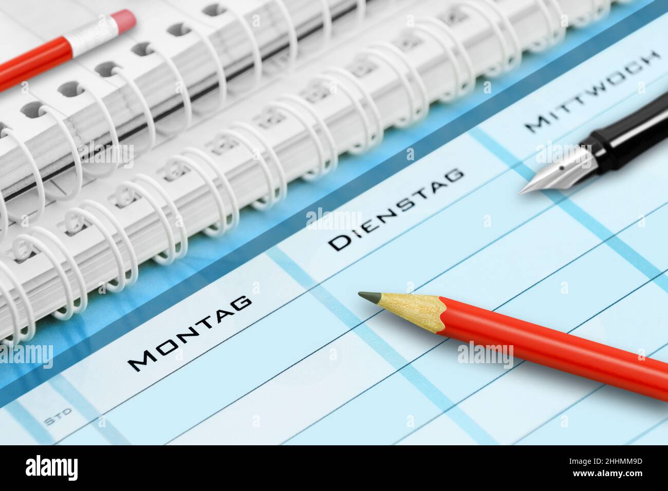 German school timetable and pencils closeup Monday Tuesday Wednesday ...