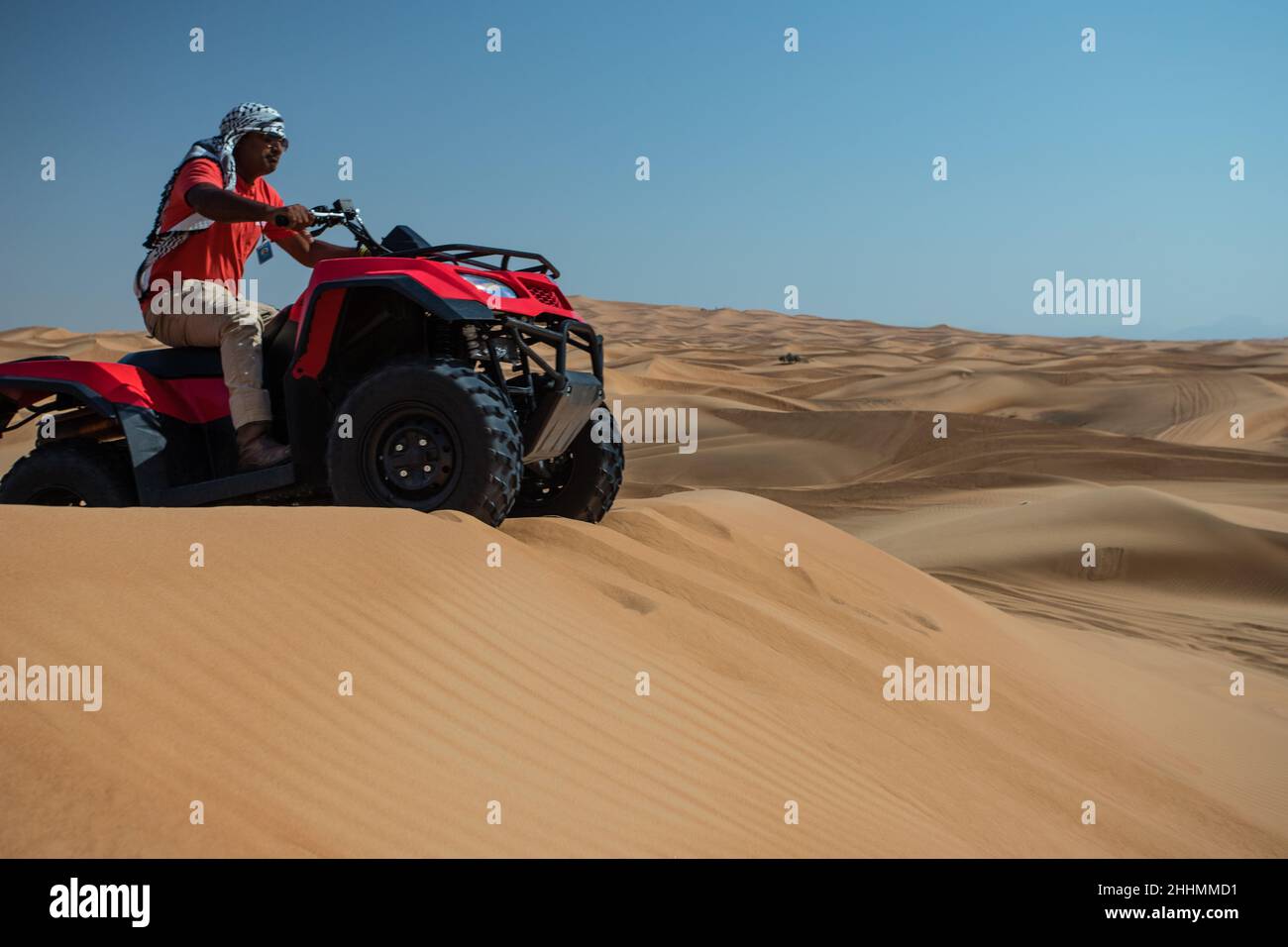 ATV Riding and Dune Bashing on a Desert Safari in Dubai, UAE Stock ...
