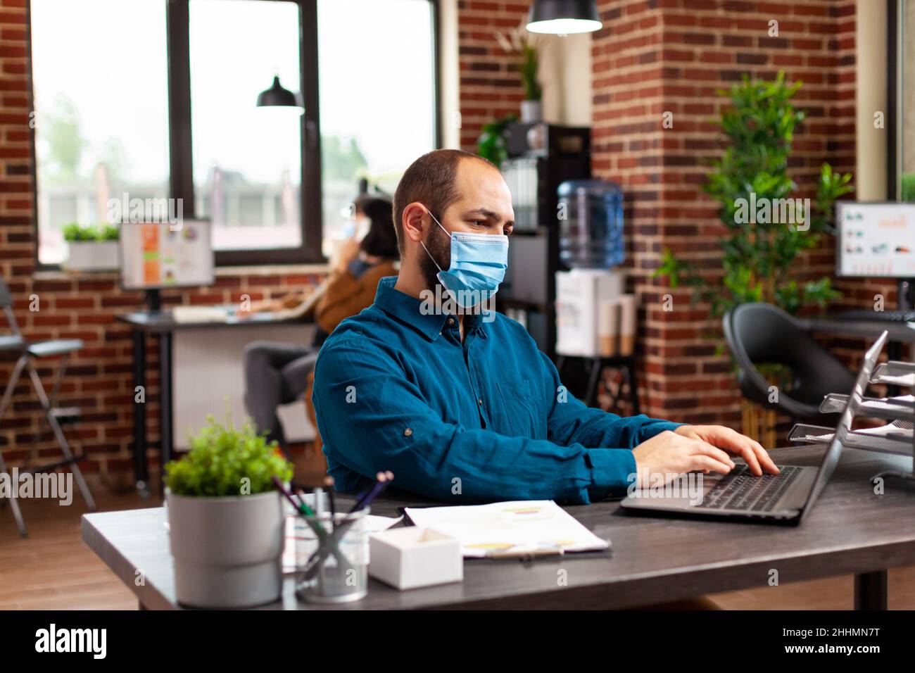 Businessman wearing protective face mask to protect infection with ...