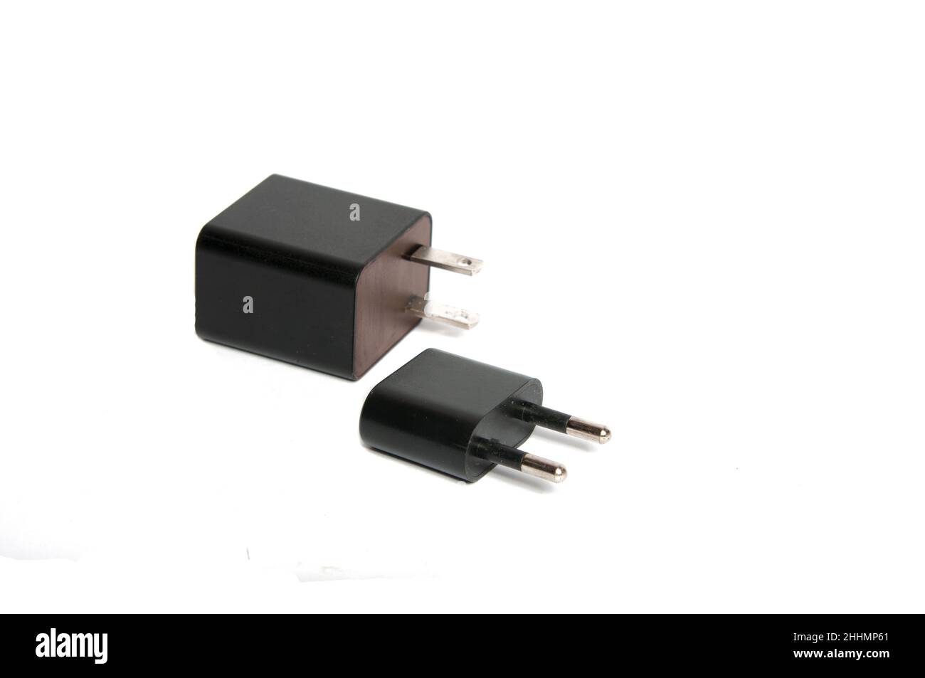 Two plugs isolated on the white background Stock Photo - Alamy