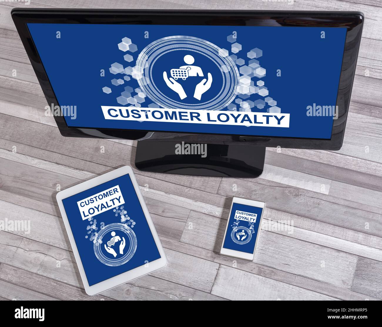Customer loyalty concept shown on different information technology ...
