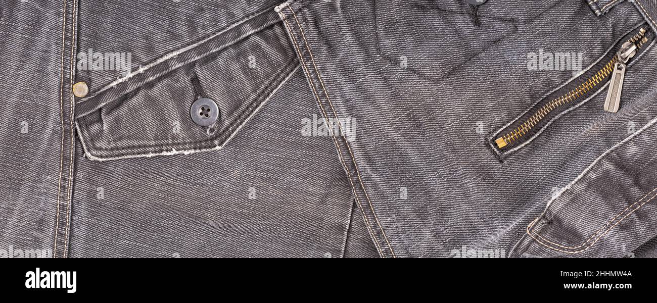 A denium gray jean closeup, banner. View of old jeans details. Denim ...