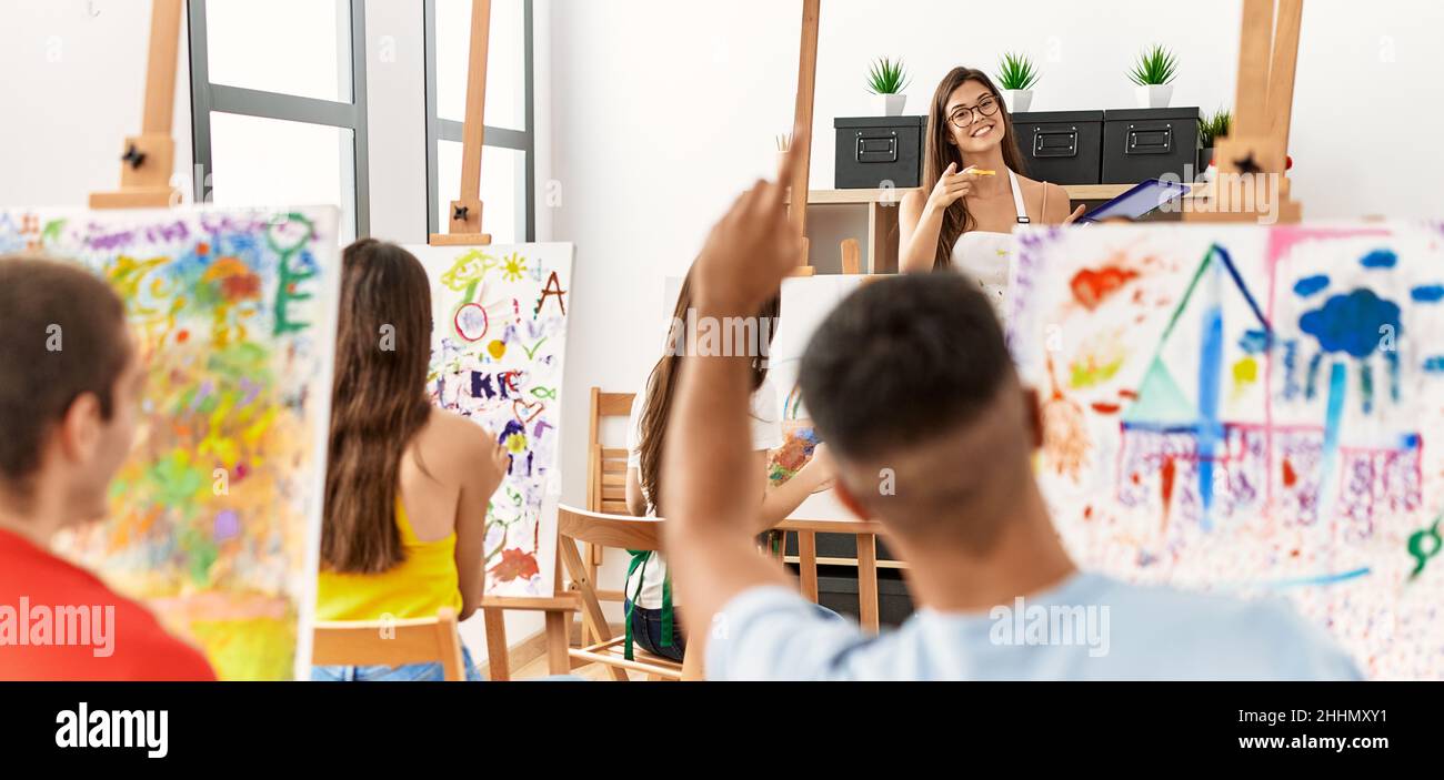 Group of people having paint lesson at art studio Stock Photo - Alamy