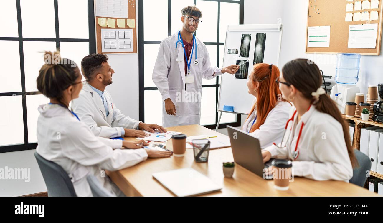 Group of young doctor discussing in a medical meeting at the clinic ...