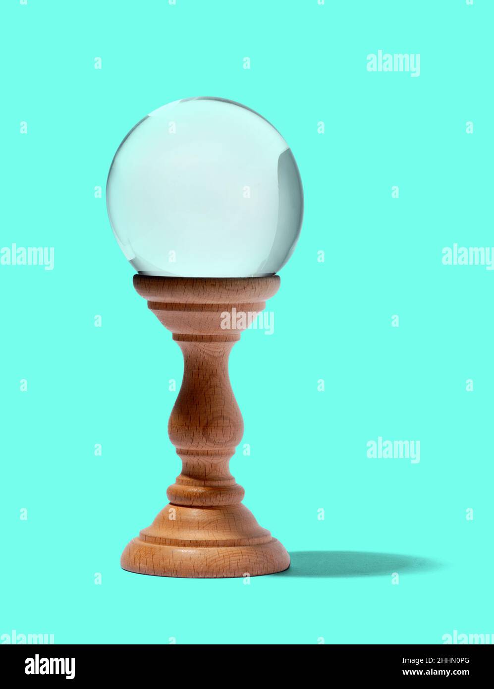 Glass globe for fortunetelling and predicting the future on a wooden ...