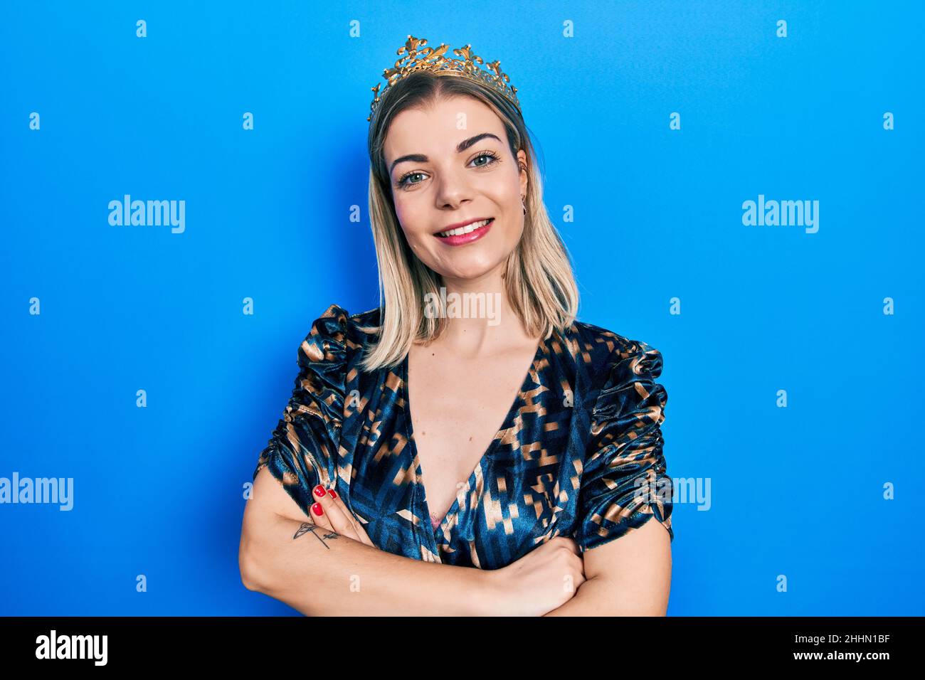 Beautiful caucasian woman wearing princess crown happy face smiling ...