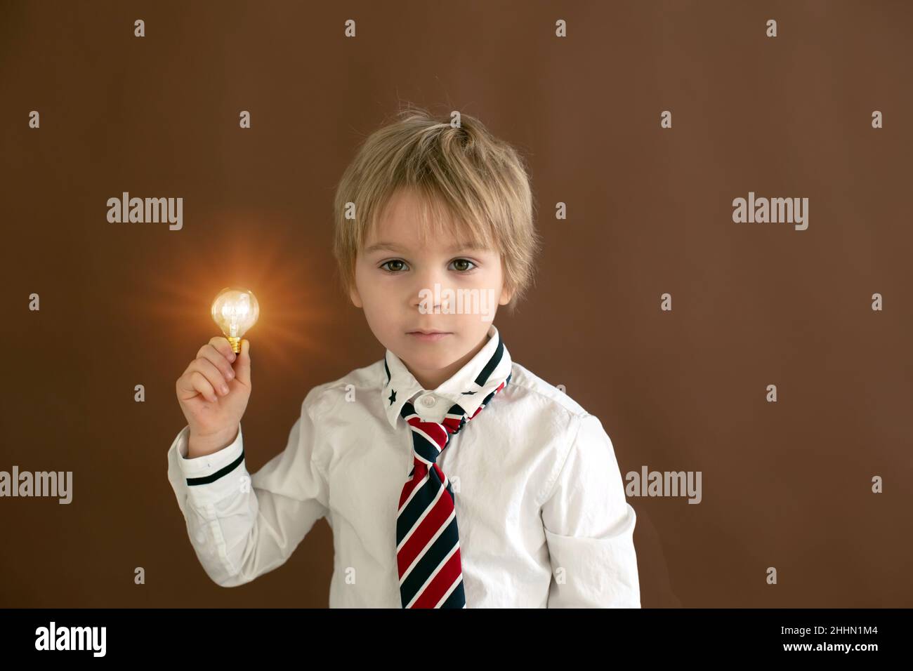 Cute toddler child, boy with smart casual clothing on isolated ...