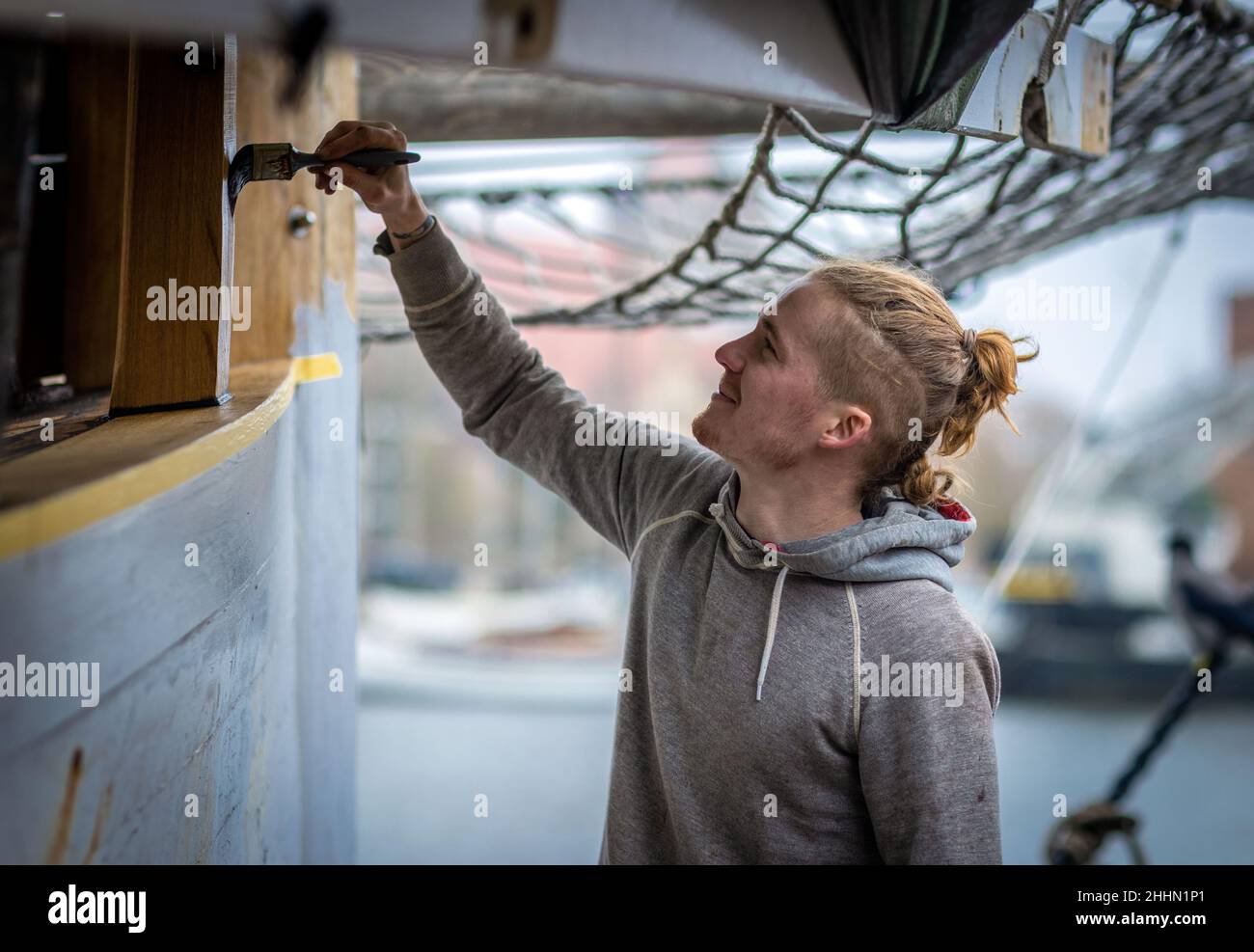 Greifswald, Germany. 25th Jan, 2022. Boatbuilder Florian Woll, current ...